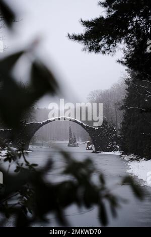 Middle Earth in Winter: An Old Stone Bridge over a Frozen Lake Stock ...