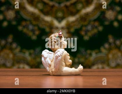 Cute Baby Eurasian Boy in a Baby seat car has his pacifier in his mouth ...