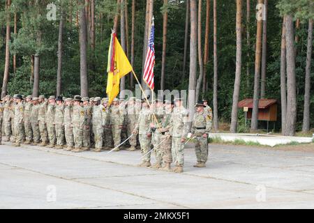 Lt. Col. Derek G. Drouin (l), commander, and Command Sgt. Maj. Jacob D ...