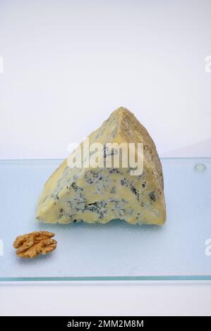 Cheese collection, piece of English old stilton blue cheese close up ...