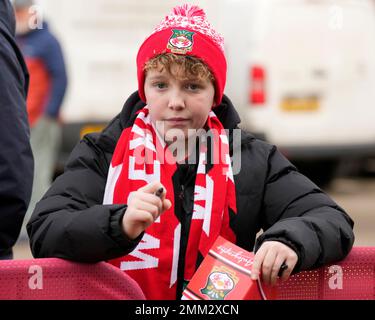 A young fan waits for players to arrive before the Sky Bet Championship ...