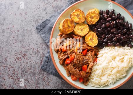Pabellon criollo is a traditional dish of Venezuela with black beans ...