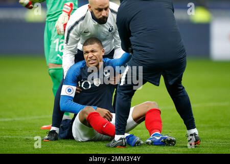 Kylian Mbappe of France jumping over Javier Mascherano of Argentina ...