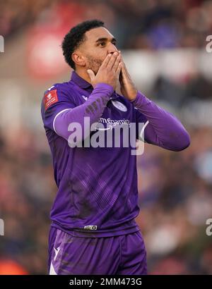 Stevenage's Jamie Reid celebrates scoring their side's first goal of ...
