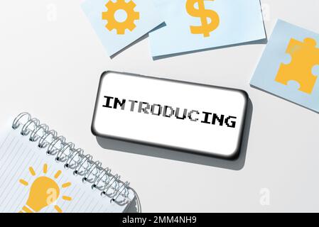 Hand writing sign Introducing. Business concept Presenting a topic or ...