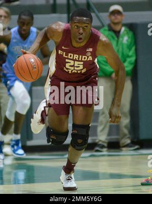 Florida State's forward Mfiondu Kabengele (left) shoots against Tulane ...