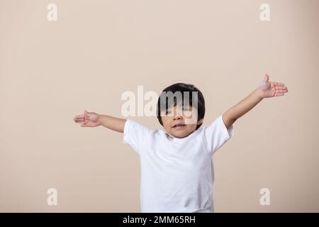 Happy Mexican little boy arms wide open Stock Photo - Alamy