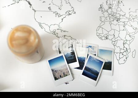 Polaroid Photos Layout of Mountains on Travel World Map with Camera ...
