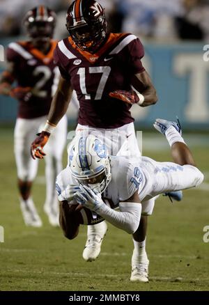 Virginia Tech's Josh Jackson (17) passes during the first half of an ...
