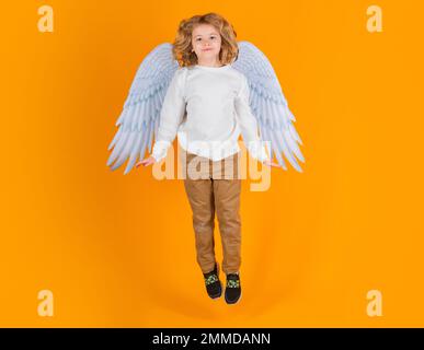 Little angel jump, kids jumping, full body. Little angel fly. Cute ...