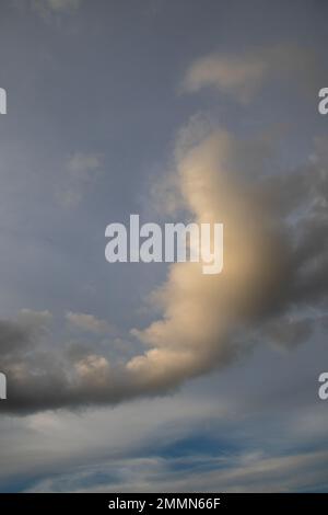Cloud formation in the shape of an arrow Stock Photo - Alamy