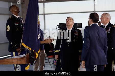 From left to right: Maj. Michael Tomlin, brigade operations officer ...