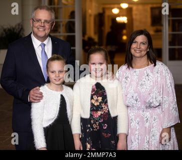 Prime Minister Scott Morrison and daughters Abbey and Lily arrive at an ...