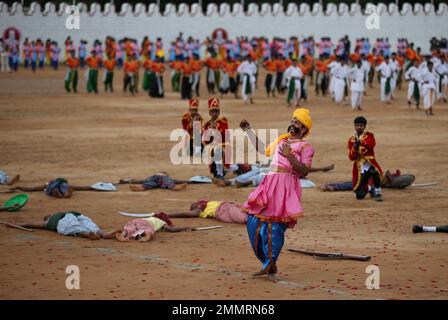 School children enact a scene of India's pre-independence era during ...