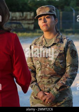 Illinois Governor JB Pritzker talks with a reporter as he walks to ...