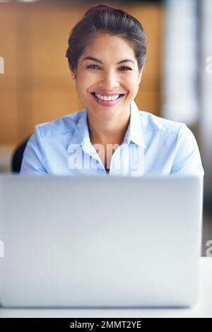 She delivers top-quality work. Portrait of a female designer at her ...