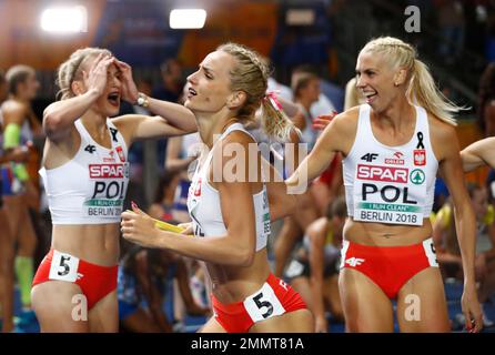 The Polish team celebrate winning the gold medal in the women's 4x400 ...