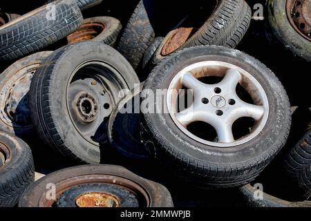 Discarded car tyres Stock Photo - Alamy