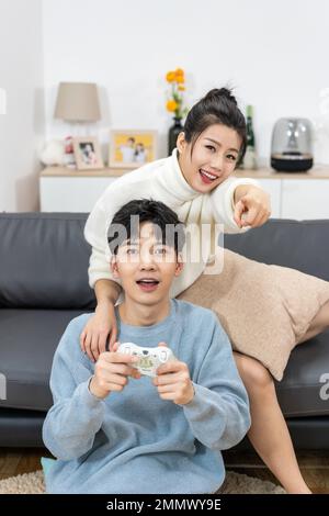 Young lovers play games Stock Photo - Alamy