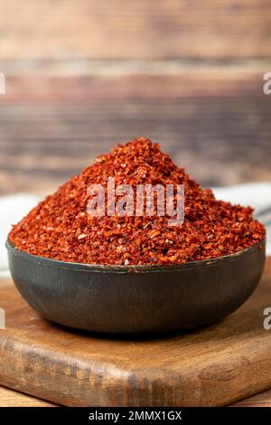 Colorful ground spicy chili peppers , pimento and curcuma is clay pots ...