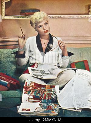 Vintage publicity still for the 1950 movie Never A Dull Moment, with (l ...