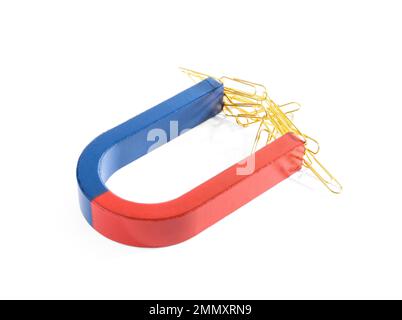 Magnet attracting paper clips on white background, top view Stock Photo ...