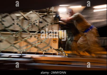 U.S. Airmen from the 375th Logistics Readiness Squadron operate a 25K ...