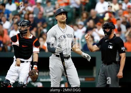 New York Yankees Giancarlo Stanton smiles while he stands on third base ...
