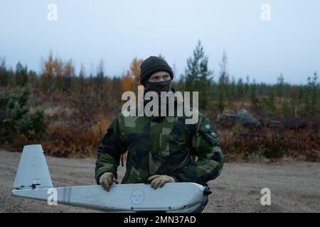 A Swedish Army unmanned aerial vehicle (UAV) operator, assigned to I 19 ...