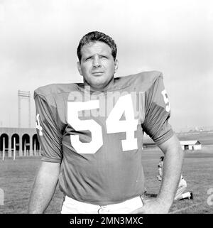 Jim Ringo, center for the Philadelphia Eagles poses with a horseshoe as ...