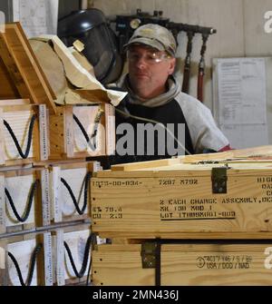 A Crane Army Ammunition Activity explosives handler displays a warning ...