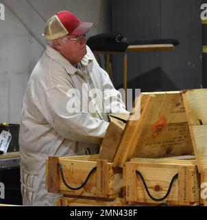 A Crane Army Ammunition Activity explosives handler displays a warning ...