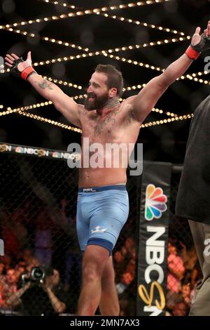 Alex Nicholson celebrates a KO against Jake Heun after their mixed ...