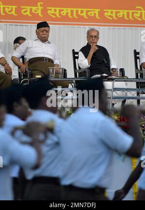 RSS Chief Mohan Bhagwat along with Assam CM Himanta Biswa Sarma and ...