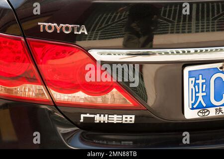 Rear with numberplate and model written in Chinese characters / writing ...