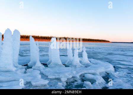 The remains of pillars of ice cut for drinking water melt standing on ...