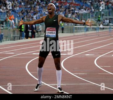 Qatar's Abderrahman Samba celebrates after winning the men's 400m ...
