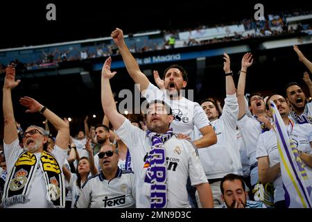Real Madrid supporters watch on big screens placed at the team's ...
