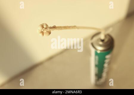 Metallic can with polyurethane foam, shallow depth of field Stock Photo ...