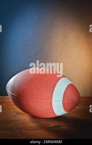 Rugby ball on table outdoors Stock Photo - Alamy