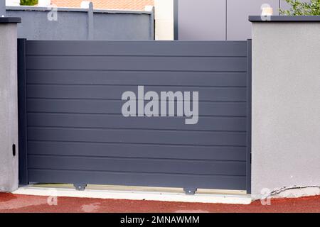 gray high aluminum gate grey double door portal of suburb house Stock ...