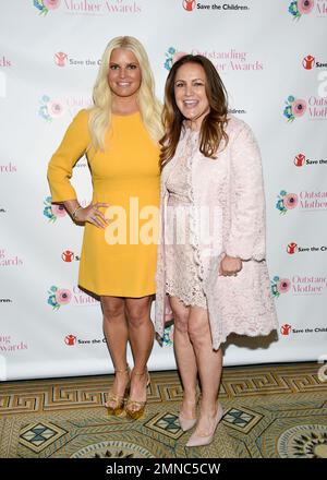 Honoree Jessica Simpson, left, poses with her mother Tina Ann Drew at ...