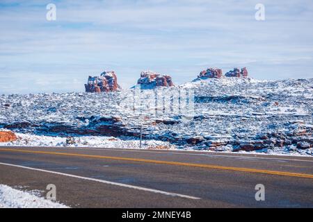 Merrimac and Monitor Butte stand guard just outside of Canyonlands ...