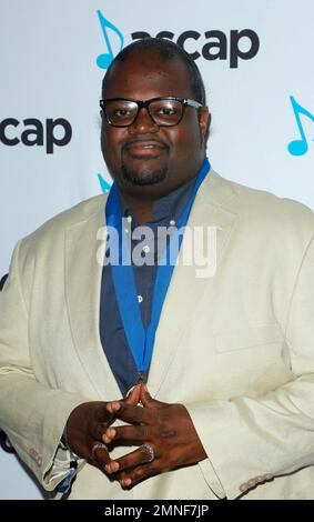 Jason Boyd, aka Poo Bear, arrives at the 59th annual Grammy Awards at ...