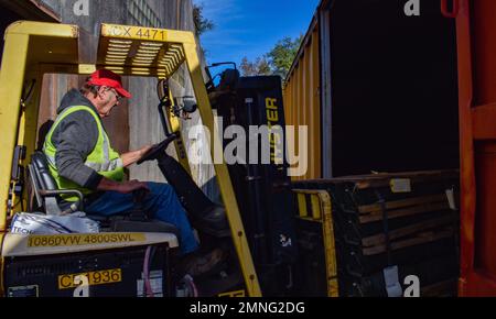 Explosive handlers at Crane Army Ammunition Activity load a railcar for ...