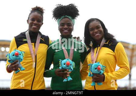 Gold medalist Nigeria's Oluwatobiloba Amusan, center, silver medalist ...
