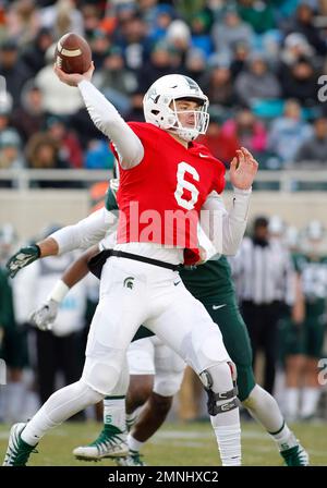 Michigan State quarterback Theo Day throws during an NCAA college ...