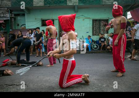 Catholic penitents whip themselves in self flagellation during the re ...