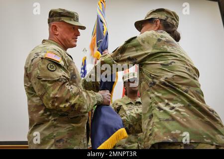 Maj. Gen. Bob D. Harter looks on during his assumption of command ...