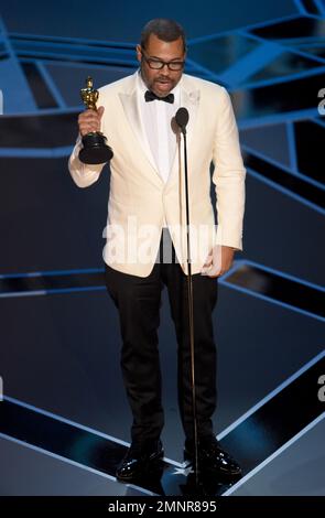 Jordan Peele accepts the award for best original screenplay for "Get ...